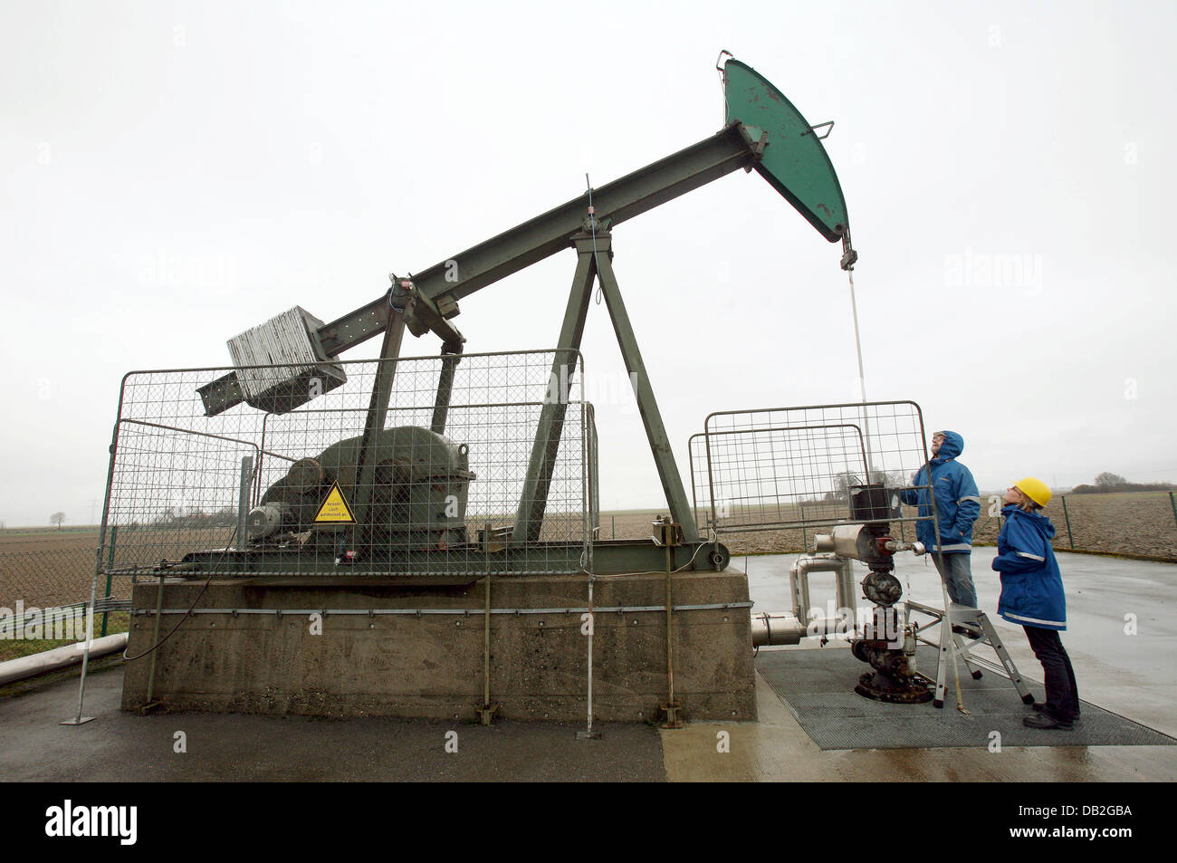 Two employees of Wintershall checks the crude oil plant near ...