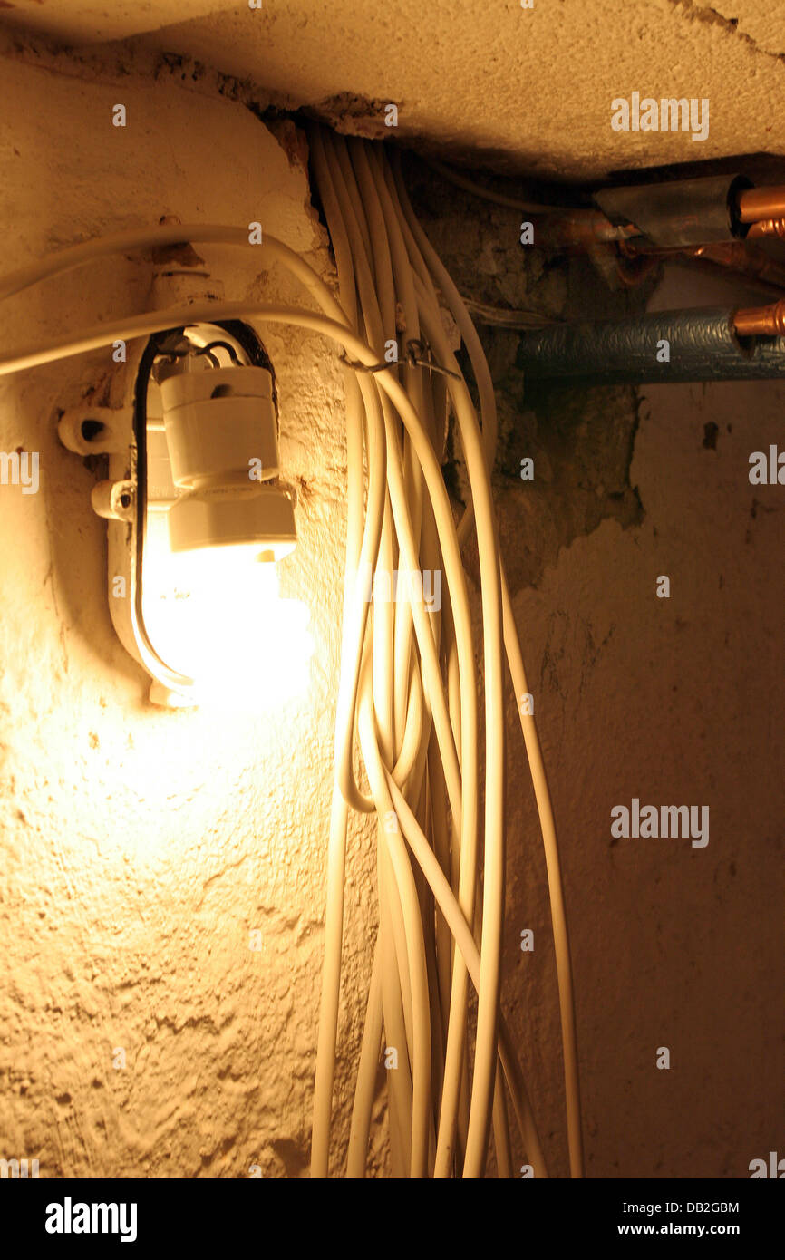 Cable laying seen at an old basement during renovation works in ...