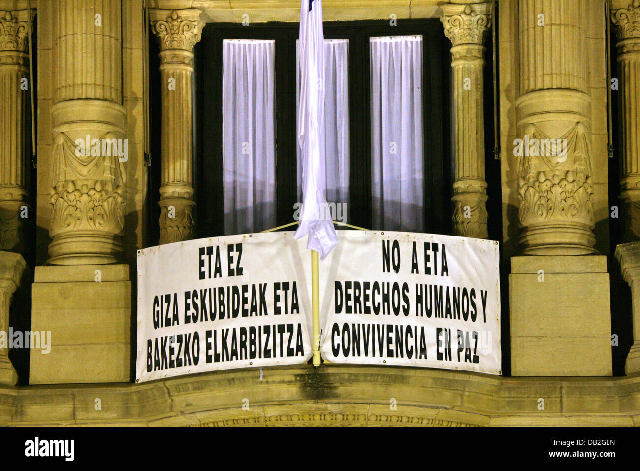 A poster attached to the town hall reads in both the Basque language ...