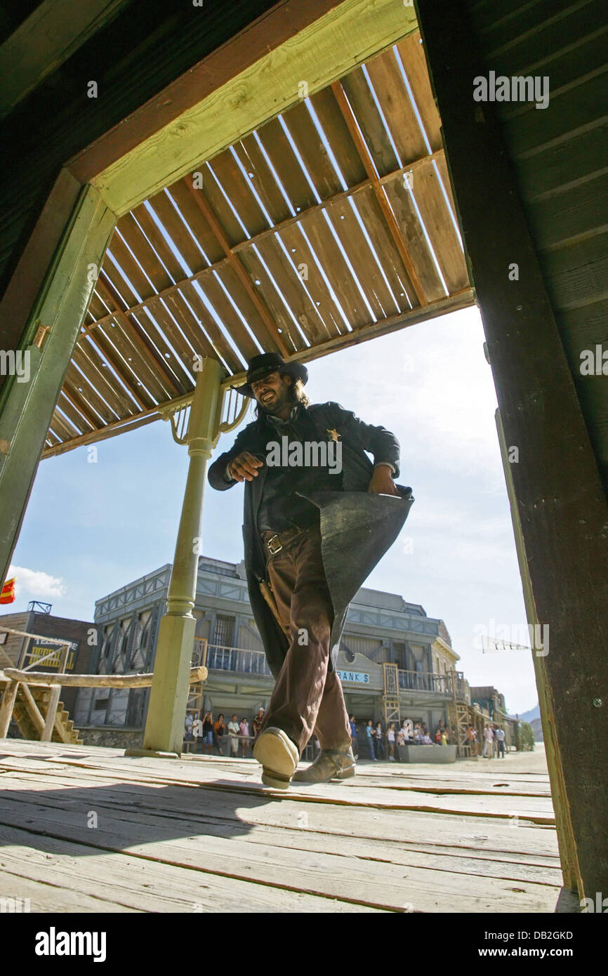 Stuntman Fernando Manzano performs for tourists visiting western style ...