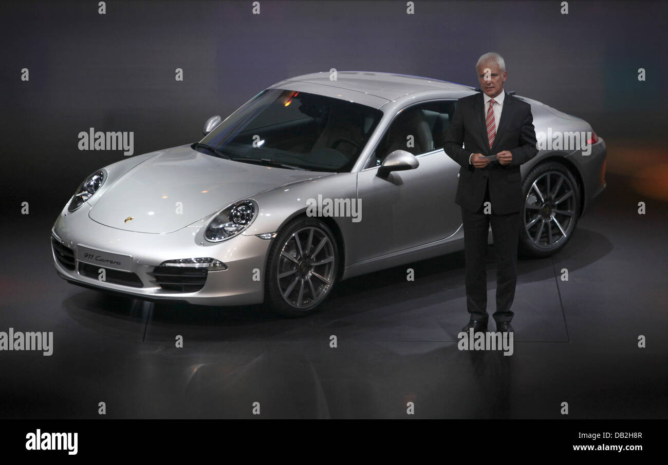 Chairman of car manufacturer Porsche Matthias Mueller presents the new ...