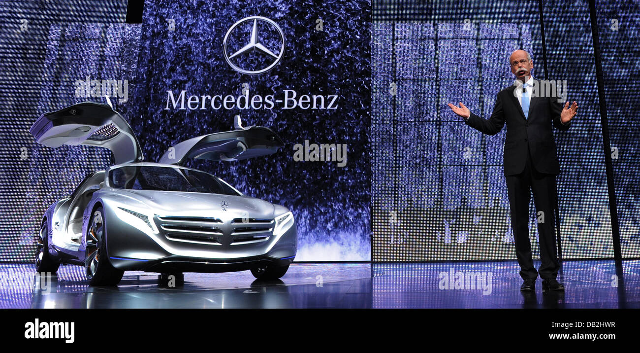 Daimler chairman, Dieter Zetsche, stands next to a Mercedes-Benz F125 ...
