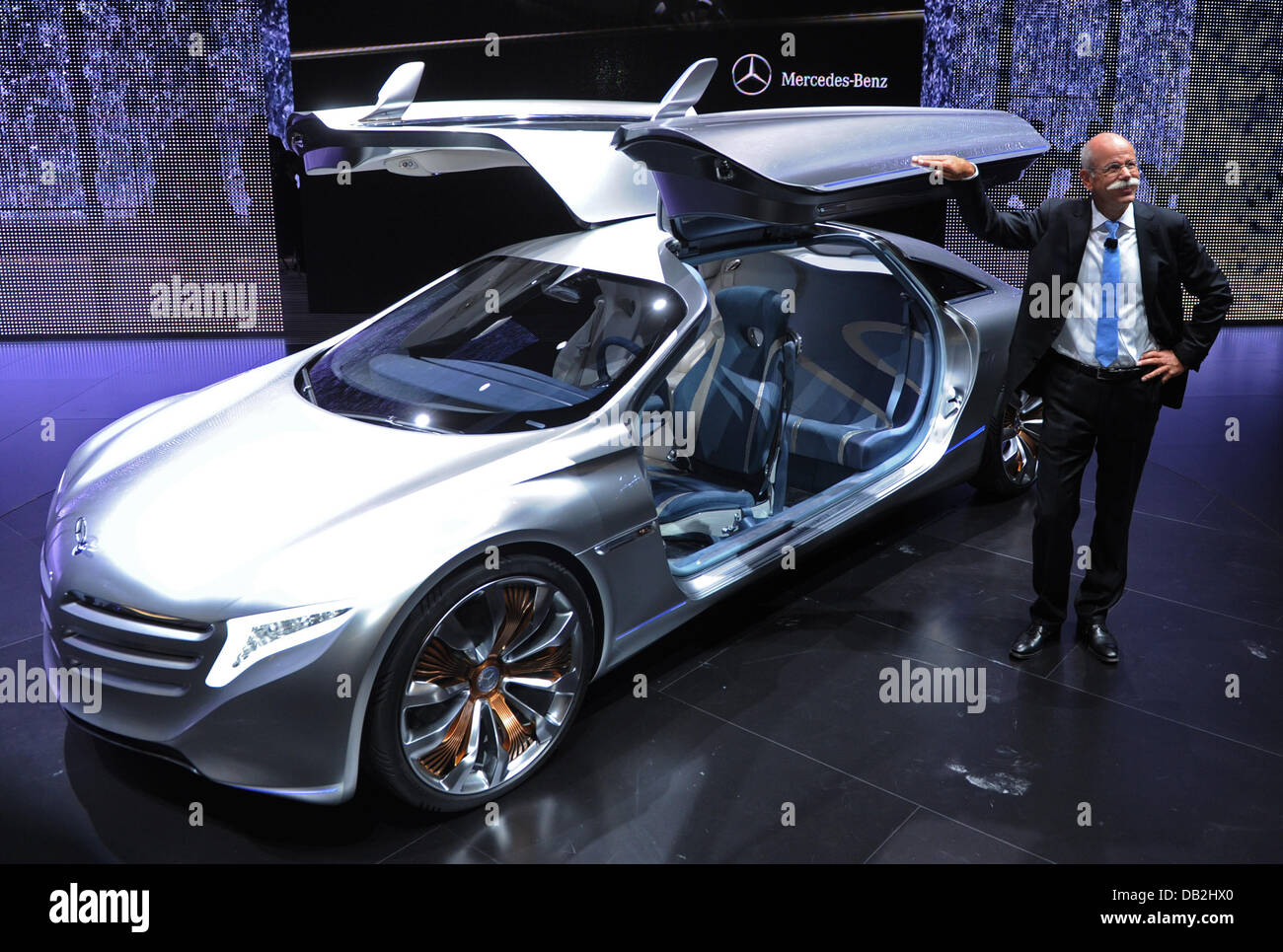 Daimler chairman, Dieter Zetsche, stands in front of a Mercedes-Benz ...