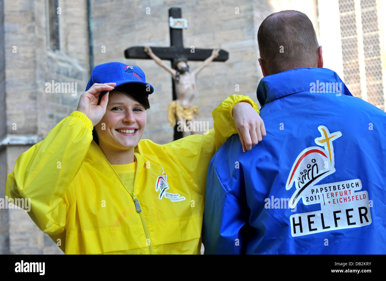 Volunteers present their volunteer clothes a few days before the pope ...