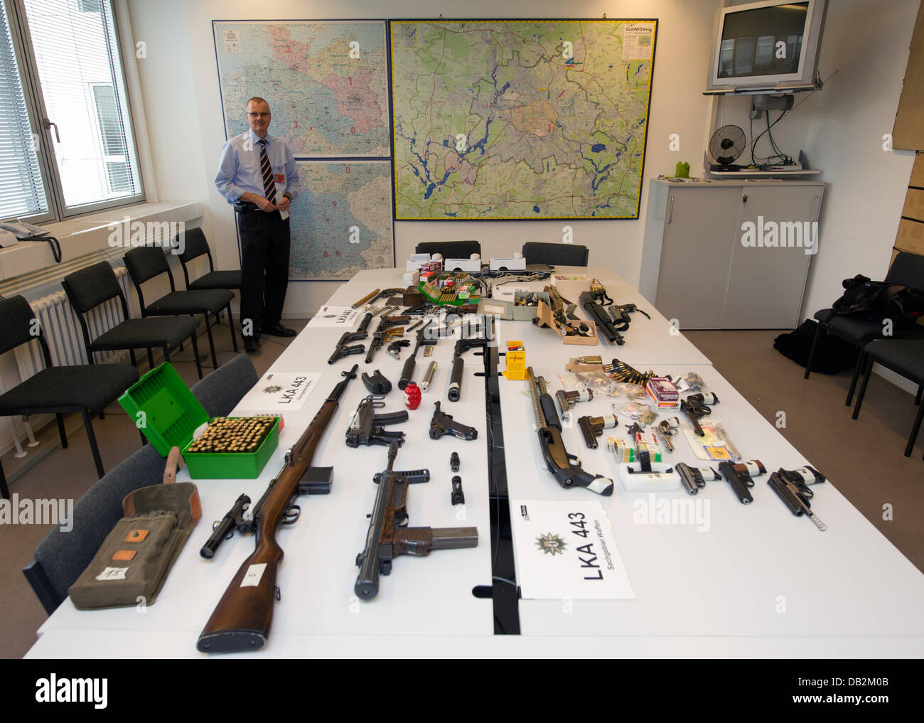 Officer Stefan Teller presents weapons and munition in Berlin, Germany ...