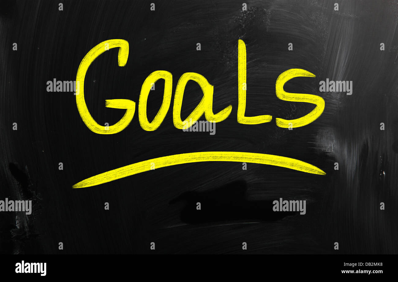 Goals handwritten with white chalk on a blackboard Stock Photo - Alamy