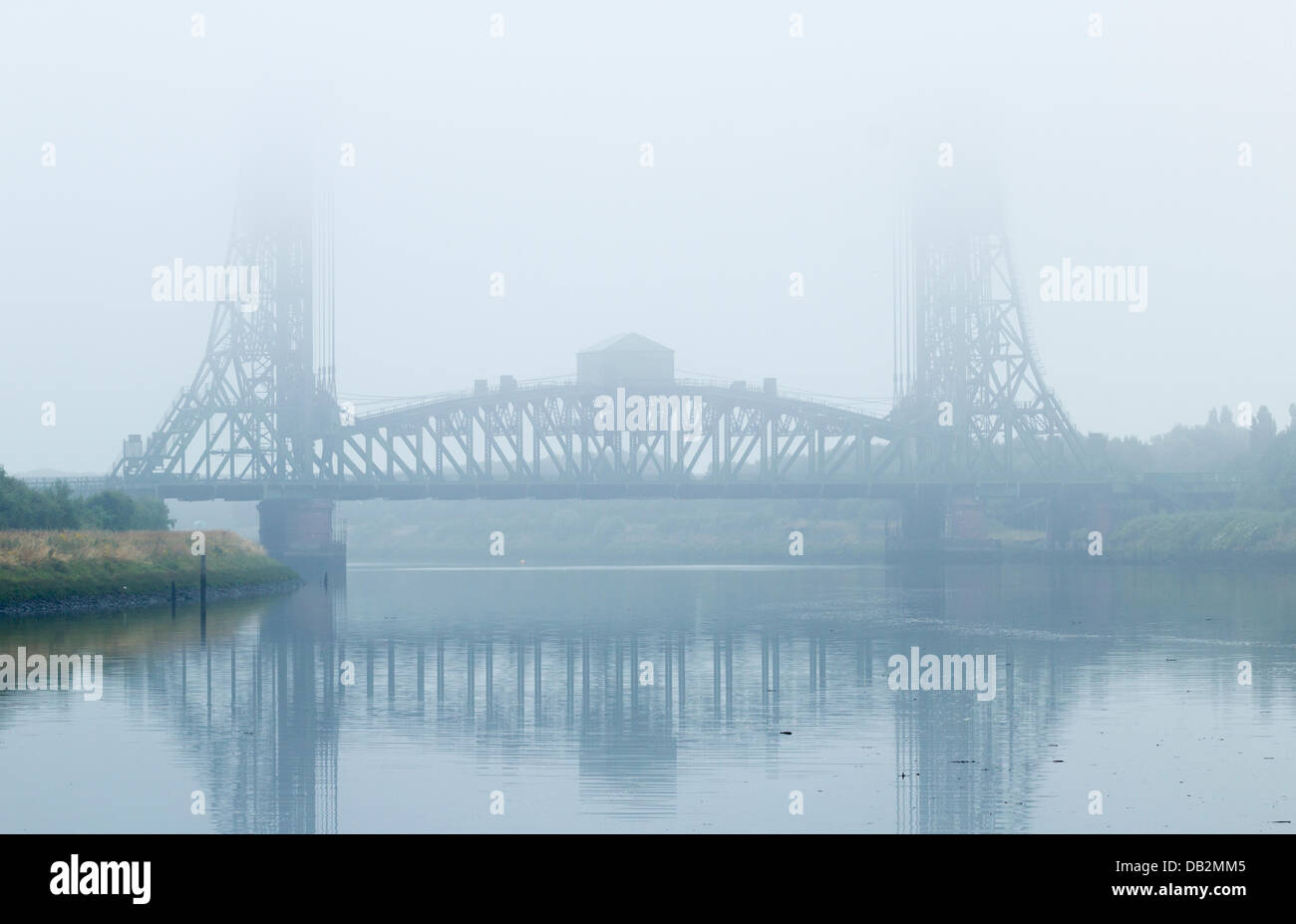 Vertical lift Newport bridge in morning mist over the river tees ...