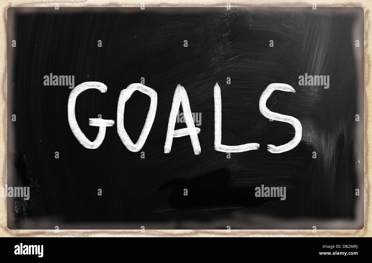 Goals handwritten with white chalk on a blackboard Stock Photo - Alamy