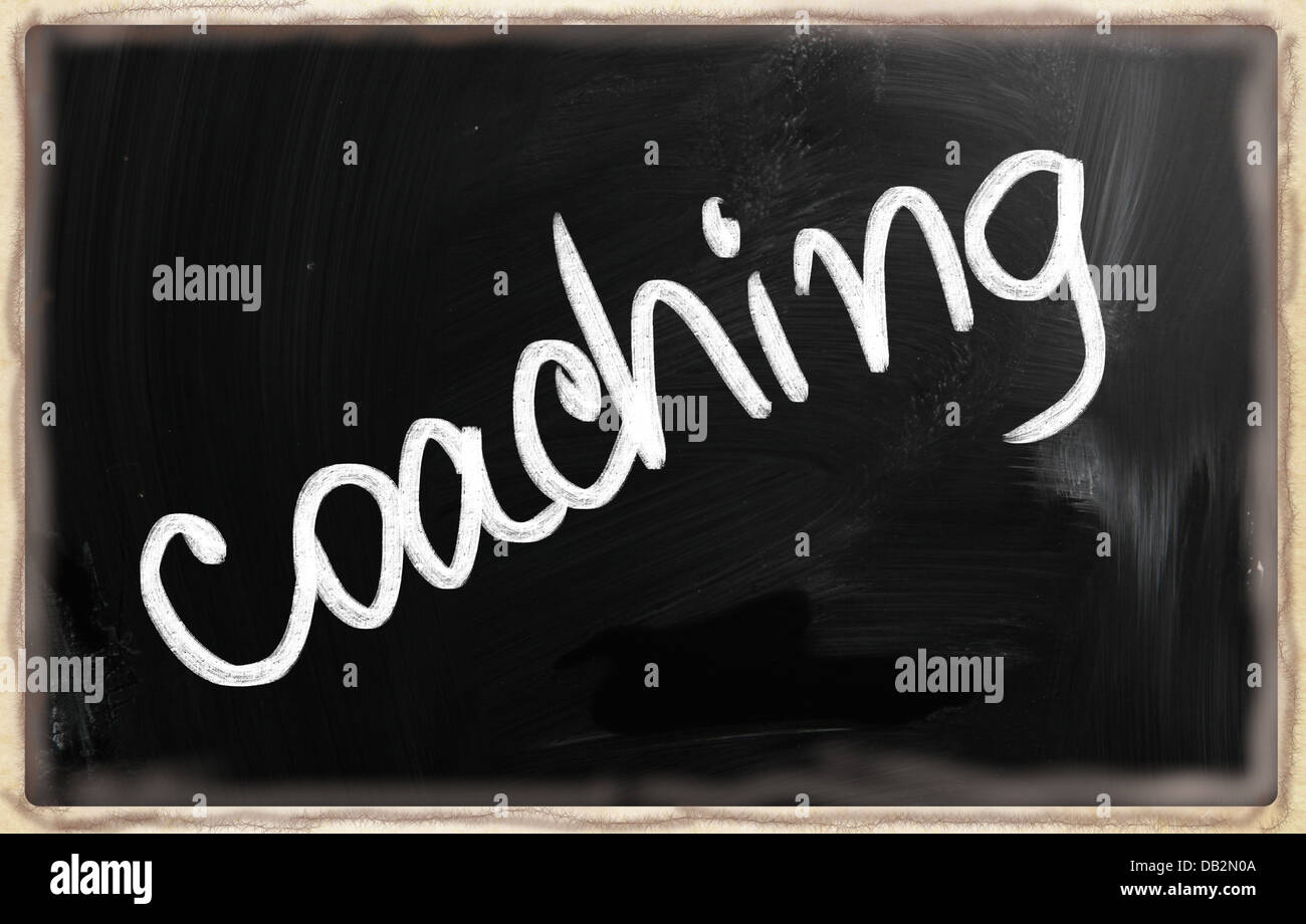 Coaching handwritten with chalk on a blackboard Stock Photo - Alamy