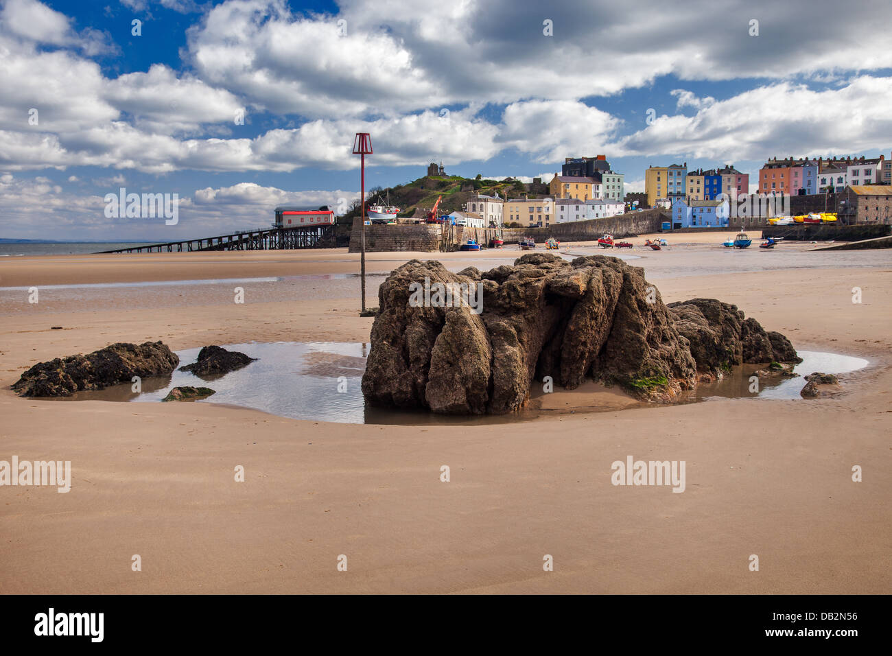 A view of Tenby Harbour showing rock pools on North Beach, Castle Hill ...