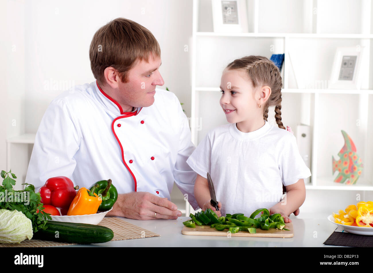 family cooking together Stock Photo - Alamy
