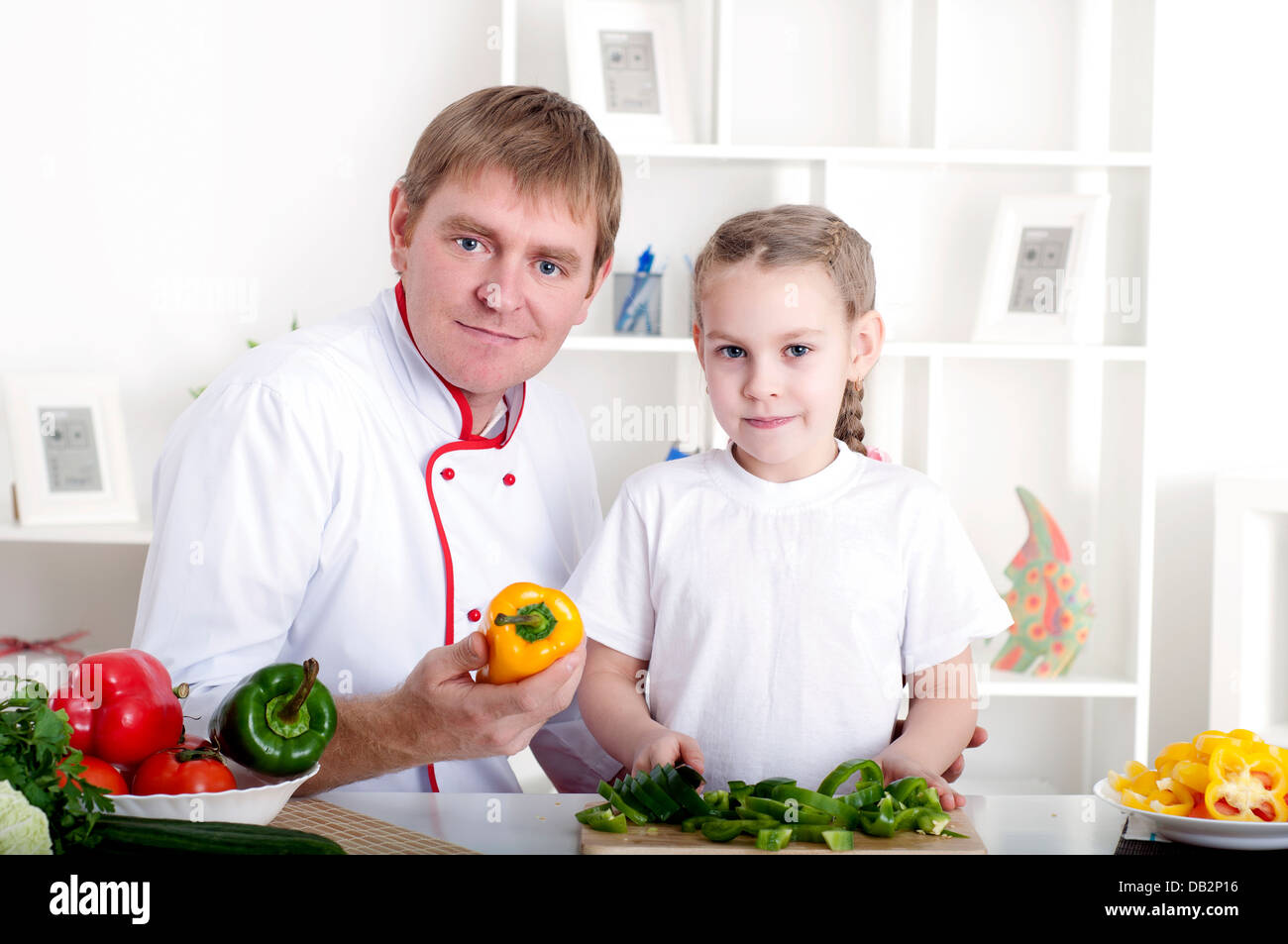 family cooking together Stock Photo - Alamy