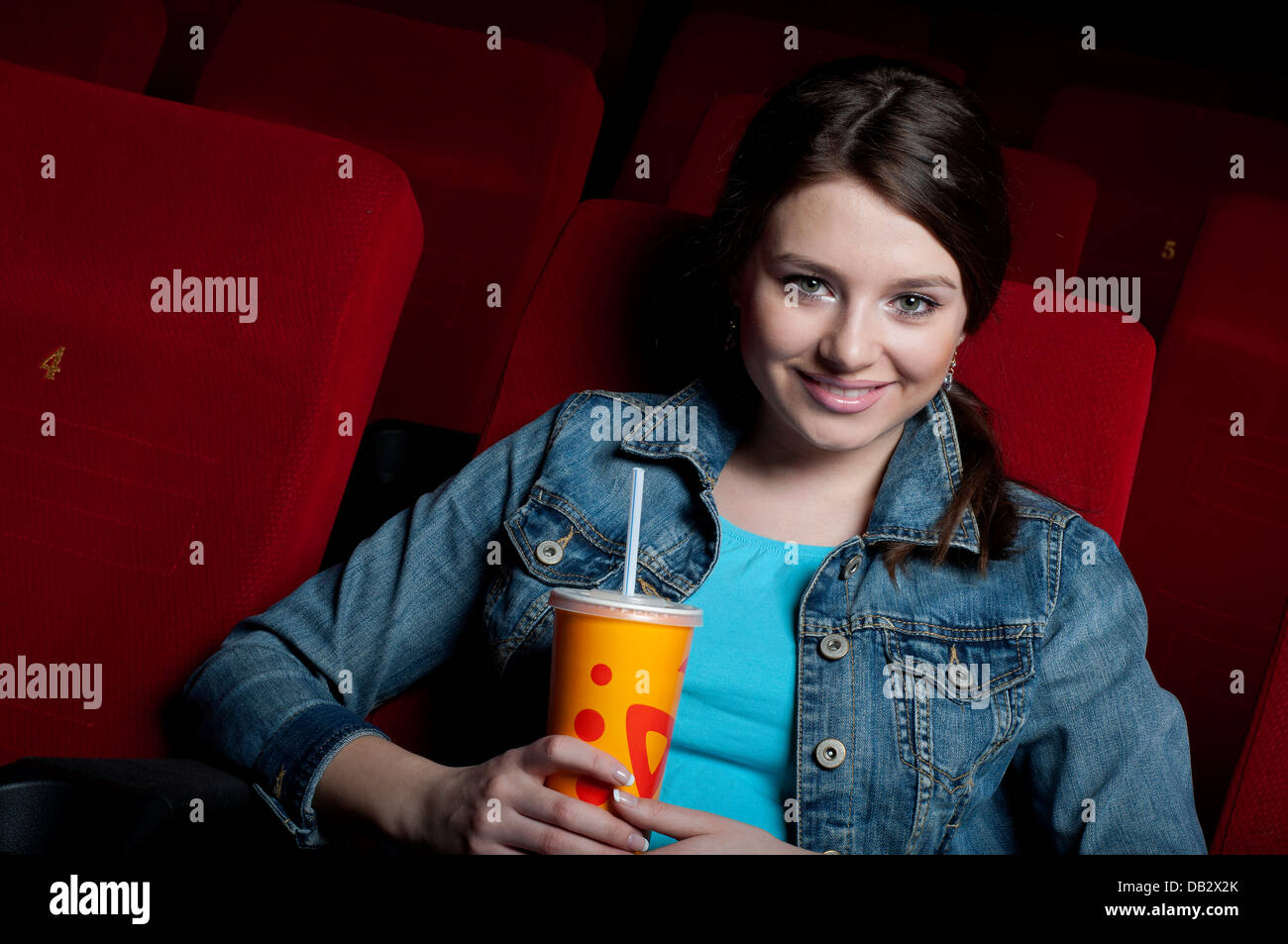 woman in cinema Stock Photo - Alamy