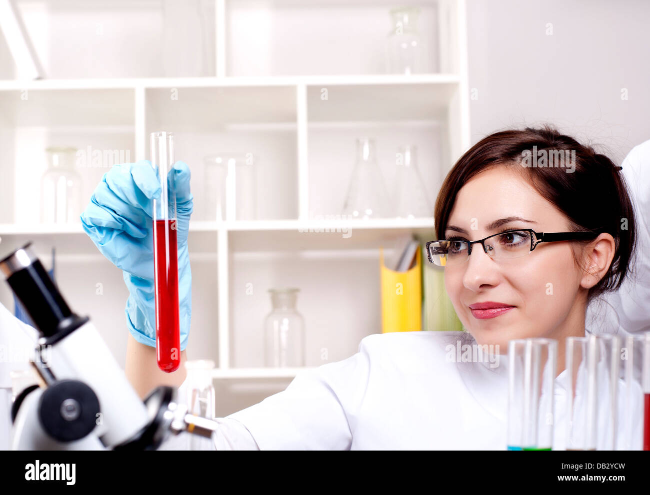 portrait of a beautiful woman chemist Stock Photo - Alamy