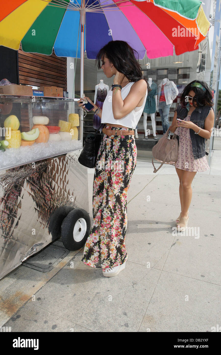 Vanessa White and Rochelle Wiseman aka Rochelle Humes purchasing a bag ...