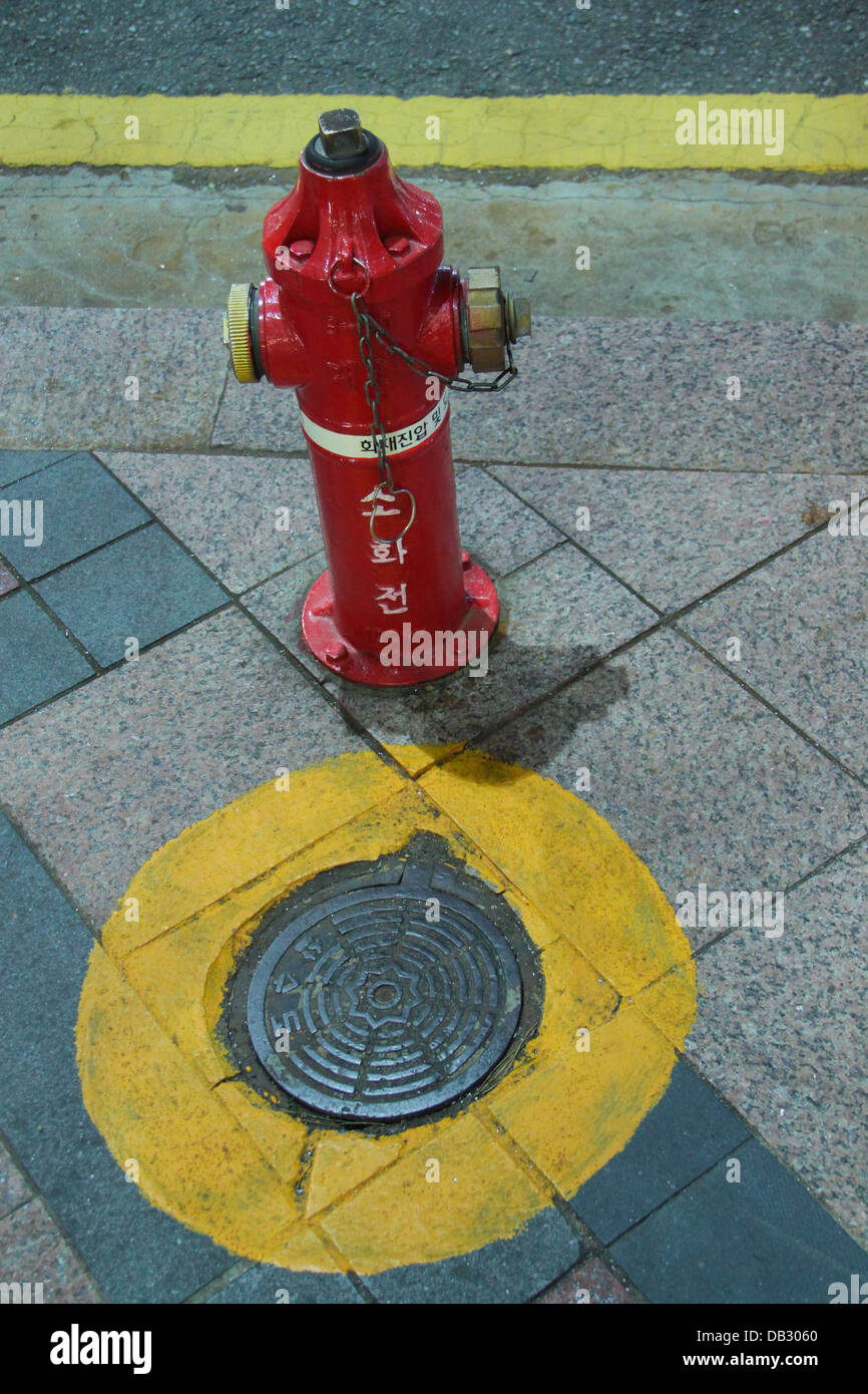 Fire hydrant hose resemble a korean word Stock Photo - Alamy
