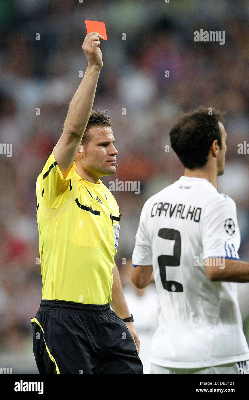 The referee shows Peter Crouch (not pictured) the red card The ...