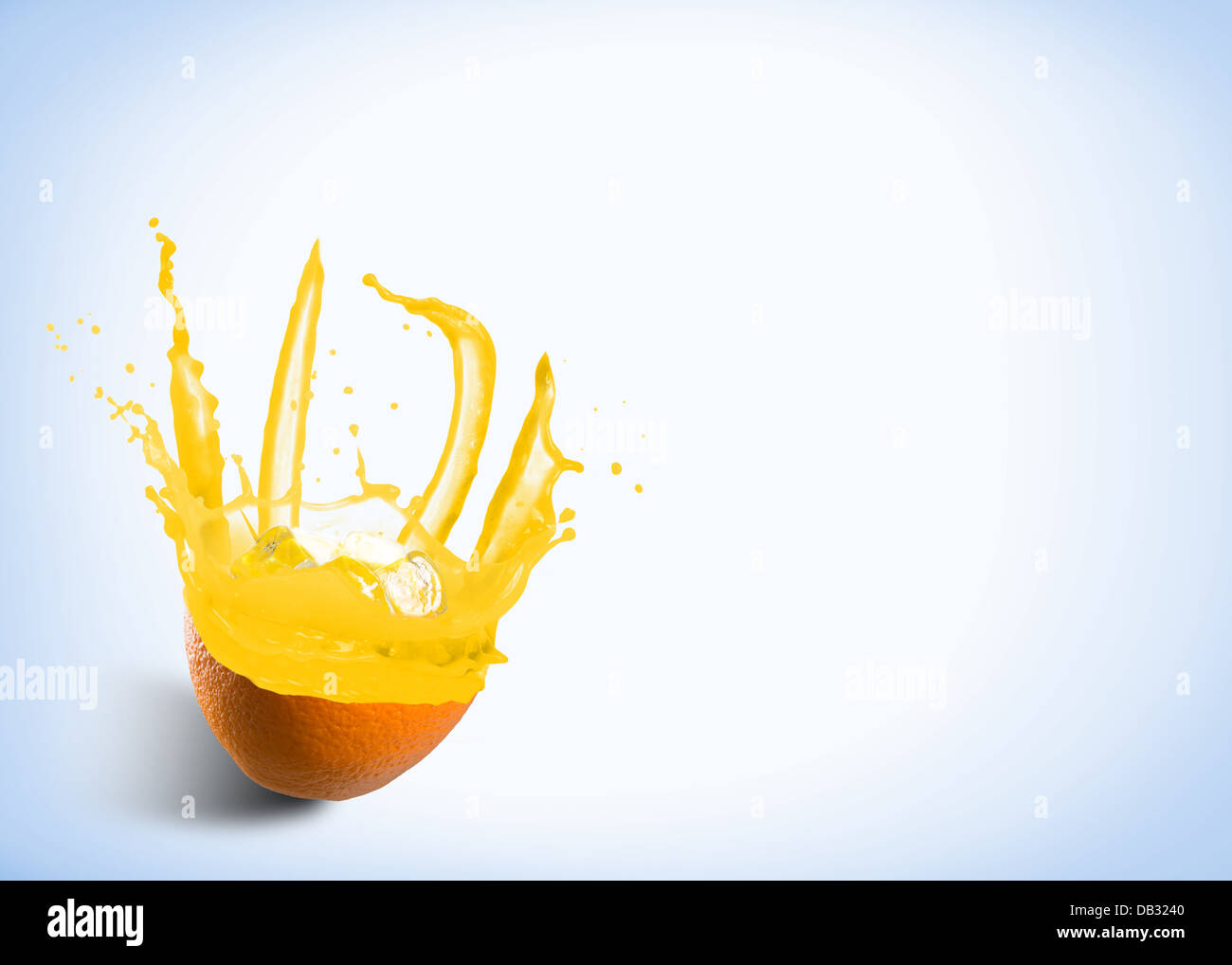 fresh orange juice with a splash Stock Photo - Alamy