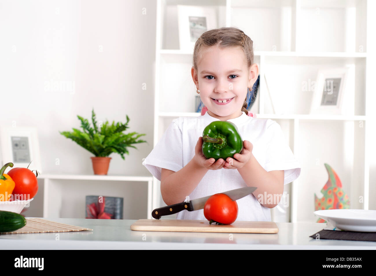 girl cooking vegetables Stock Photo - Alamy