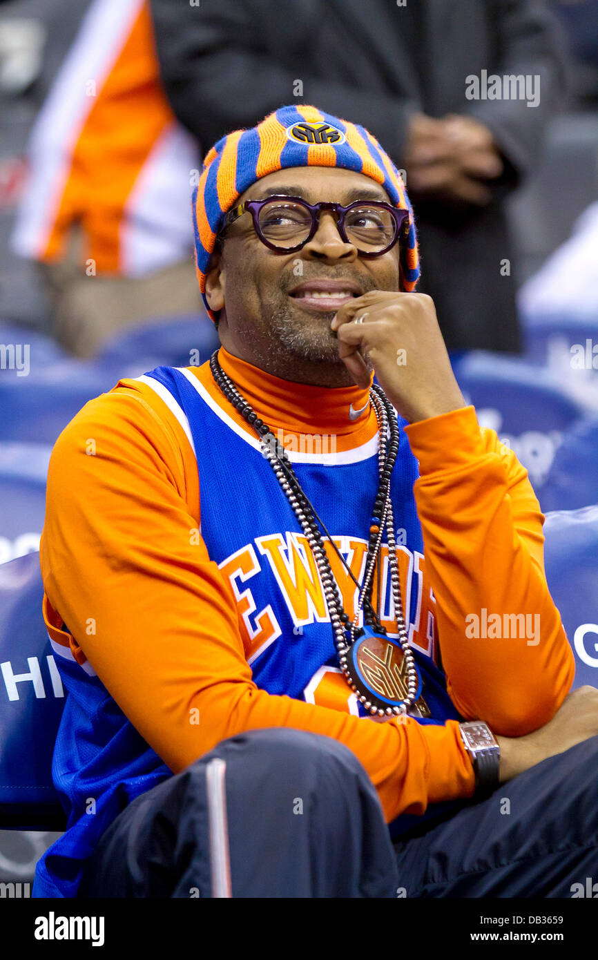 Spike Lee looks on from his courtside seat at the Prudential Center ...
