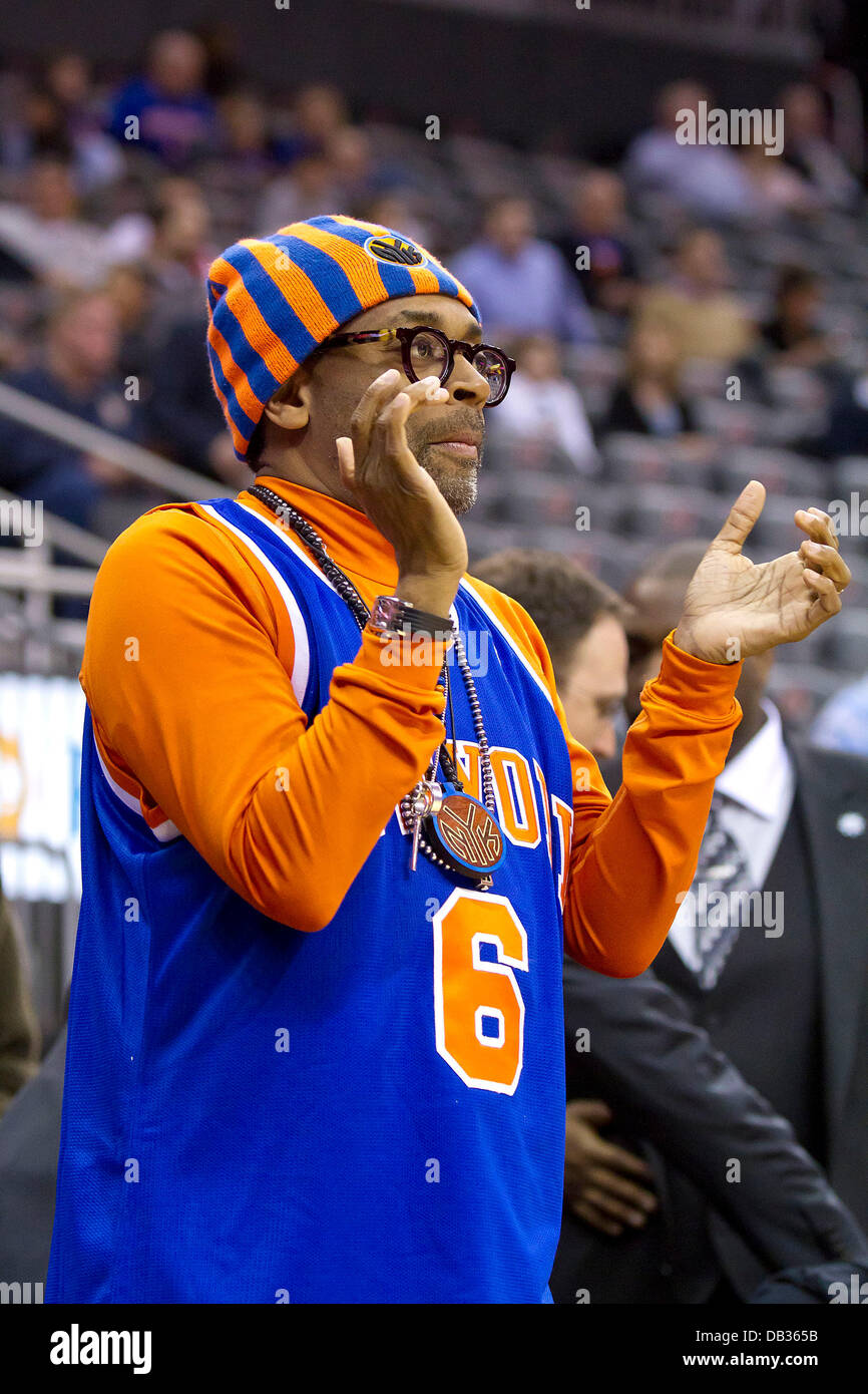 Spike Lee looks on from his courtside seat at the Prudential Center ...