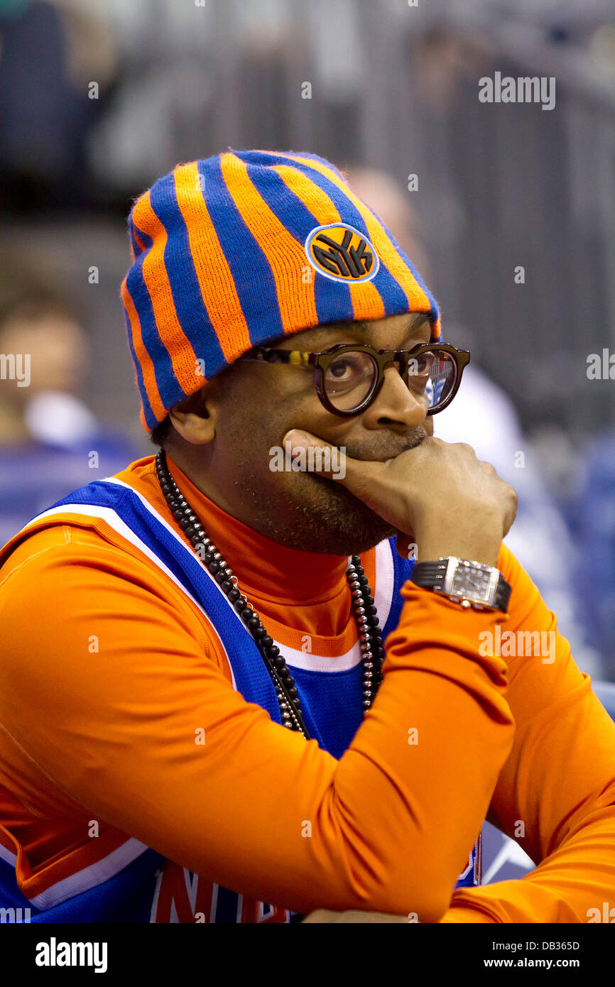 Spike Lee looks on from his courtside seat at the Prudential Center ...