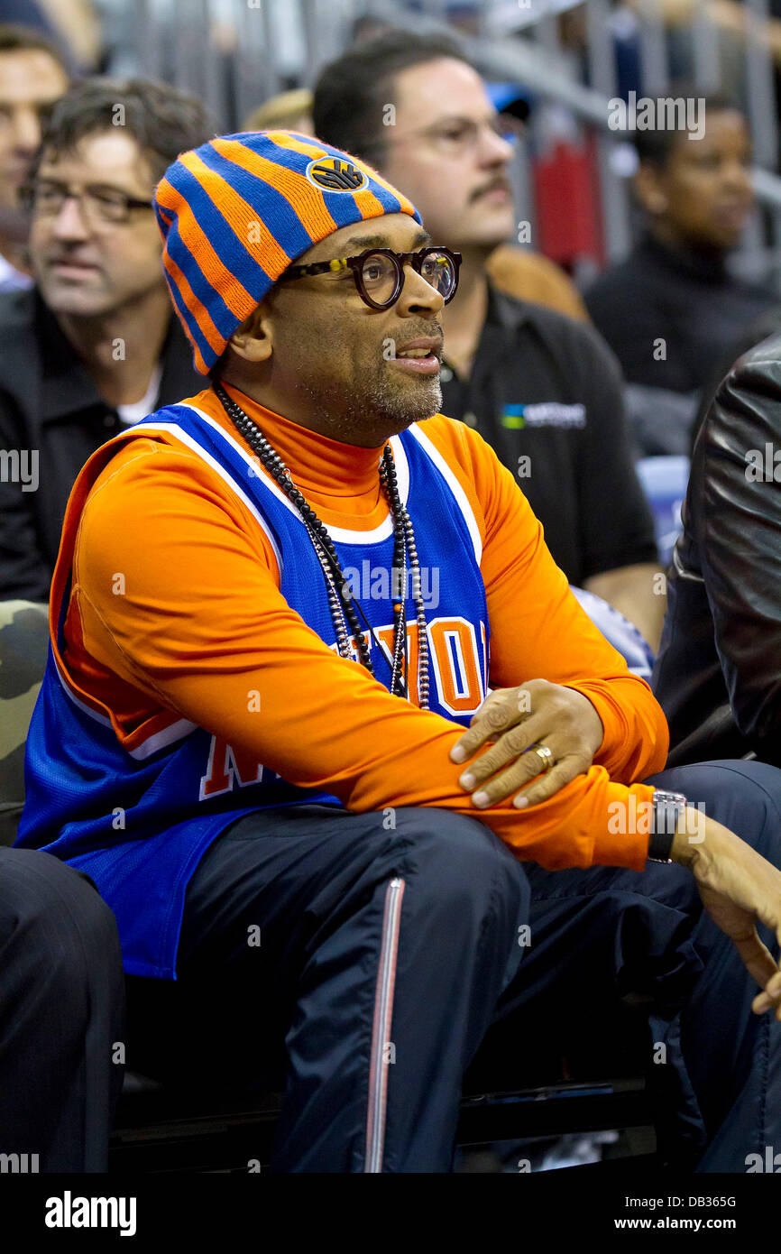 Spike Lee looks on from his courtside seat at the Prudential Center ...