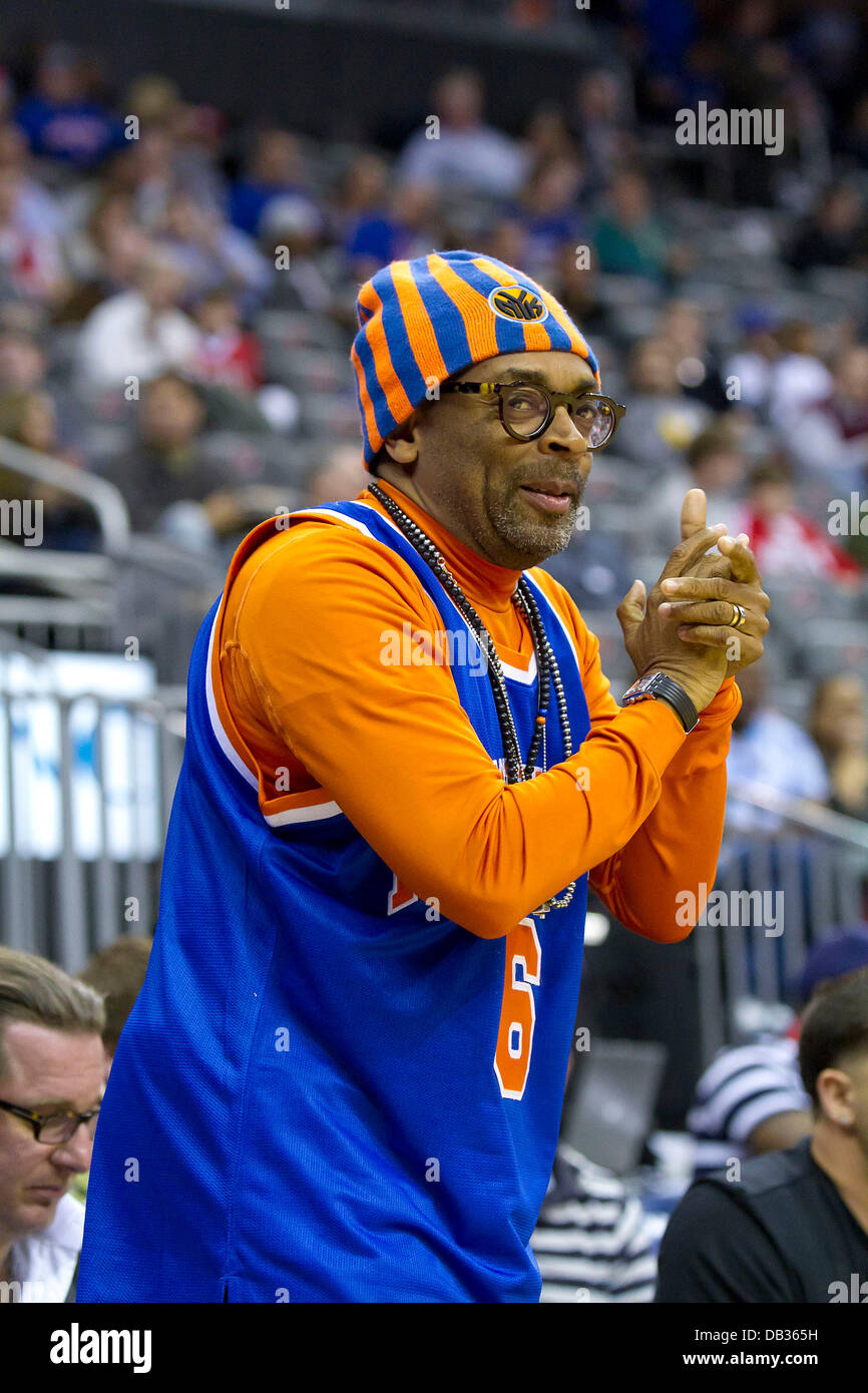 Spike Lee looks on from his courtside seat at the Prudential Center ...