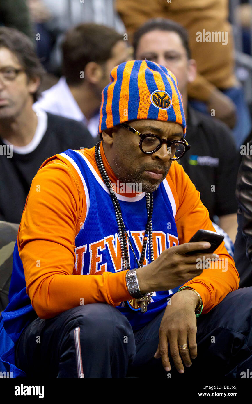 Spike Lee looks on from his courtside seat at the Prudential Center ...