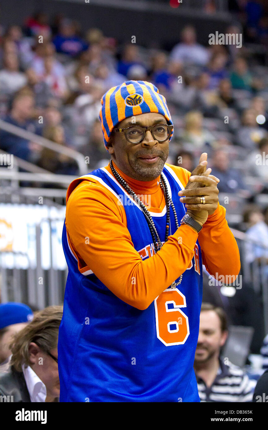 Spike Lee looks on from his courtside seat at the Prudential Center ...