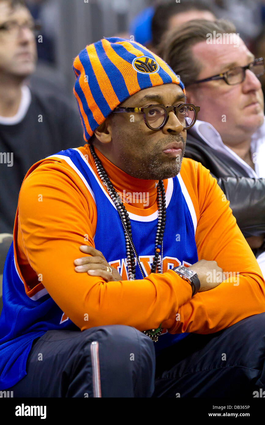 Spike Lee looks on from his courtside seat at the Prudential Center ...