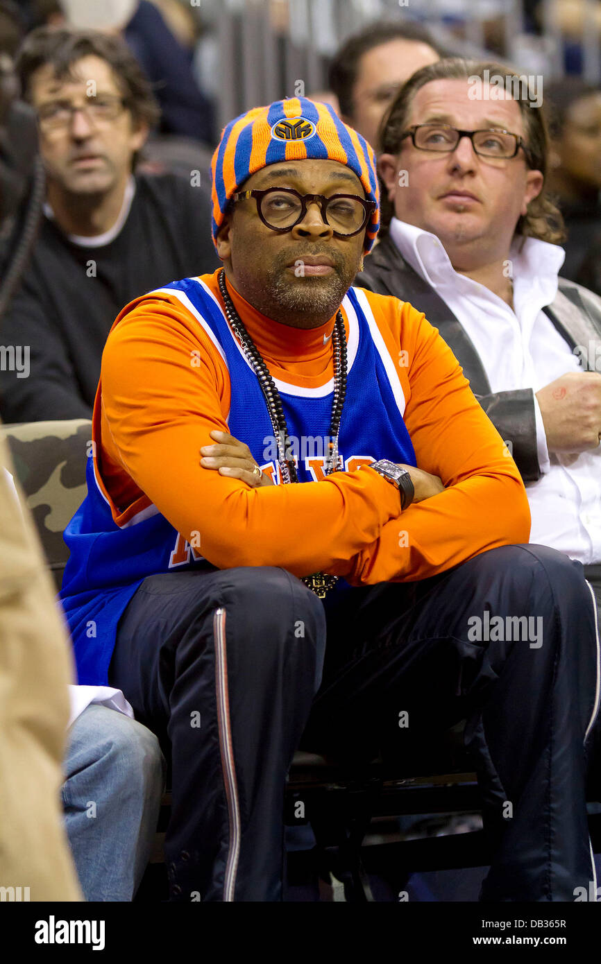 Spike Lee looks on from his courtside seat at the Prudential Center ...