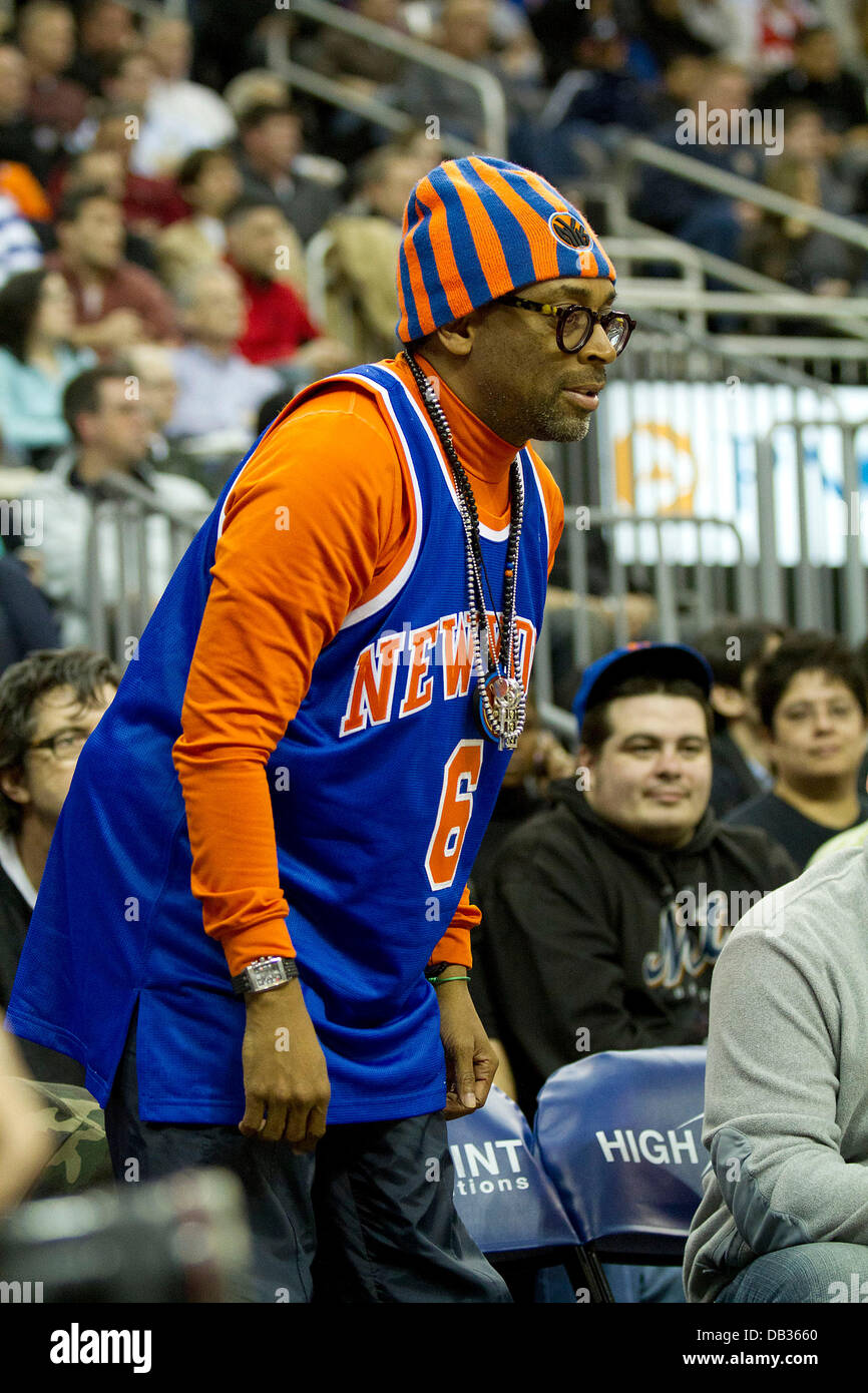 Spike Lee looks on from his courtside seat at the Prudential Center ...