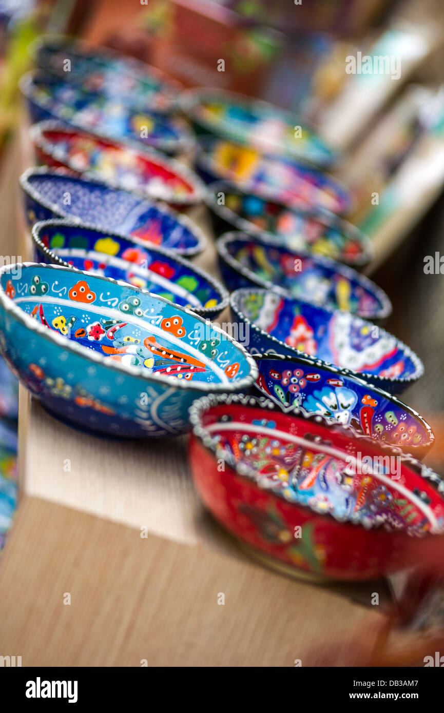 Small colorful pottery bowls in a row Stock Photo - Alamy
