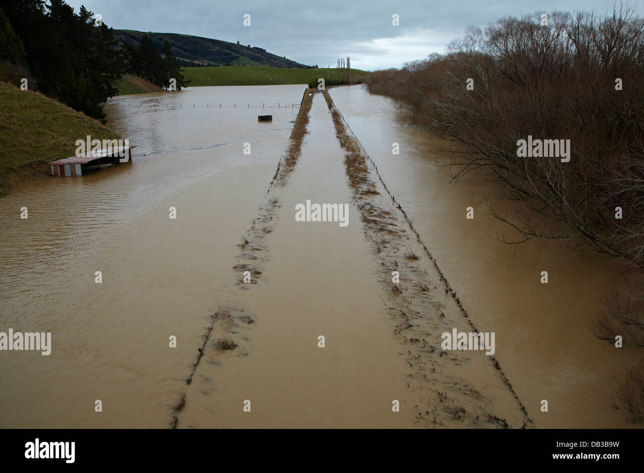 Railway lines at Allanton, flooded by Taieri River, Taieri Plains, near ...