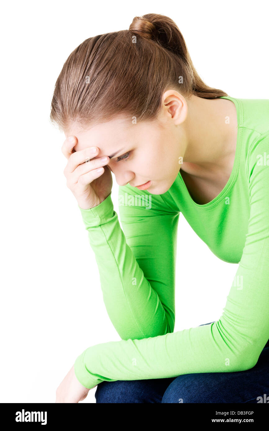 Young beautiful woman in depression. Isolated on white background Stock ...
