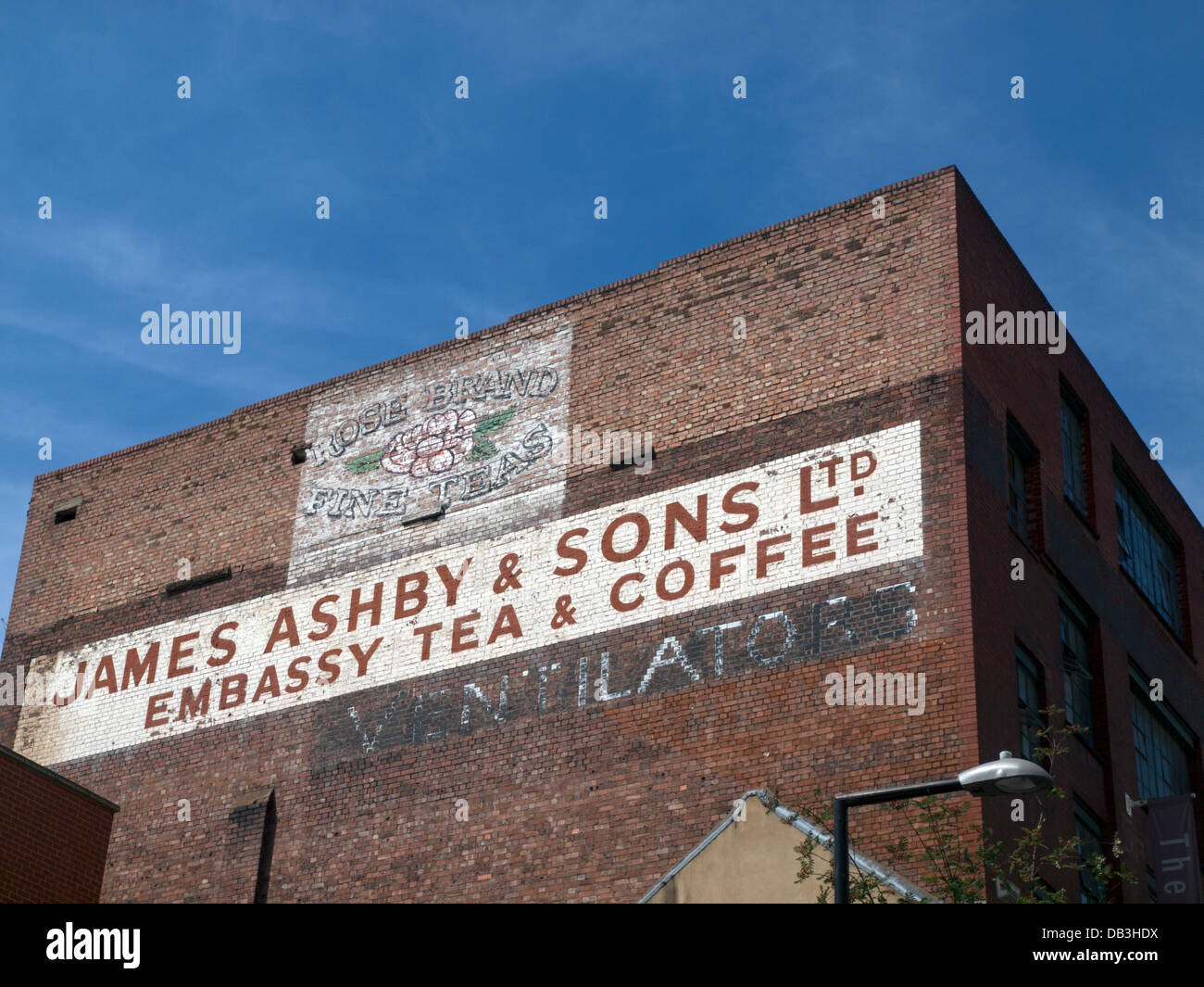 An old business sign on the side of a building in London Stock Photo ...