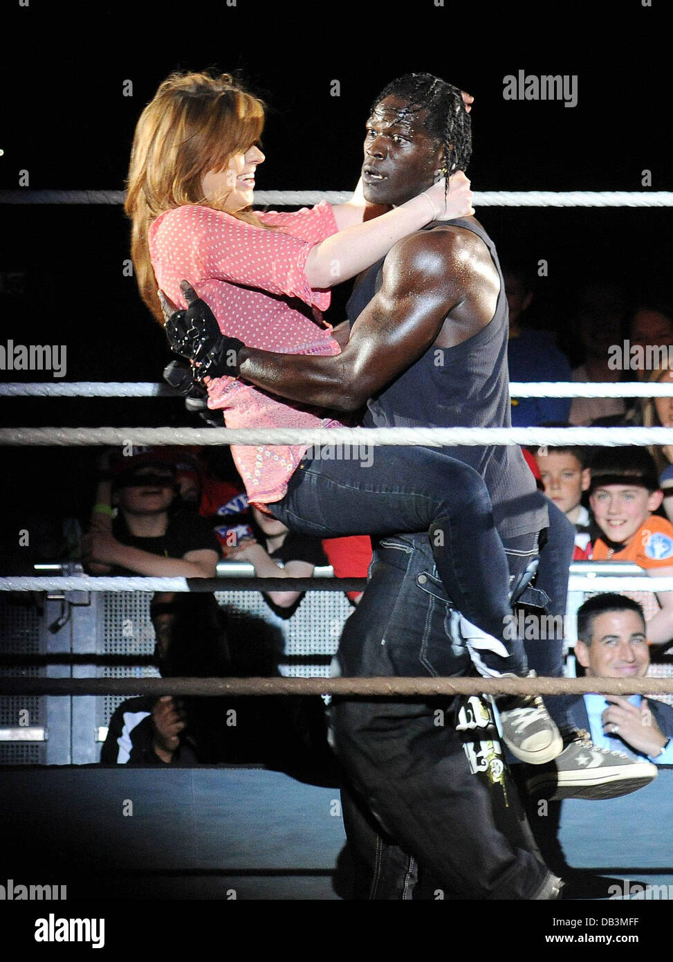 R Truth carries a fan WWE RAW Wrestling Superstars at The O2 Arena ...