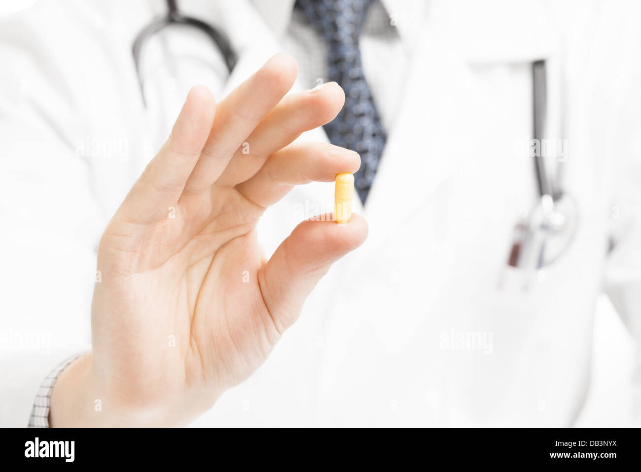 Male hand pouring white medicine hi-res stock photography and images ...