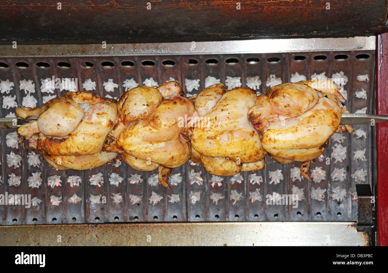 Spit roast chicken barbeque hi-res stock photography and images - Alamy