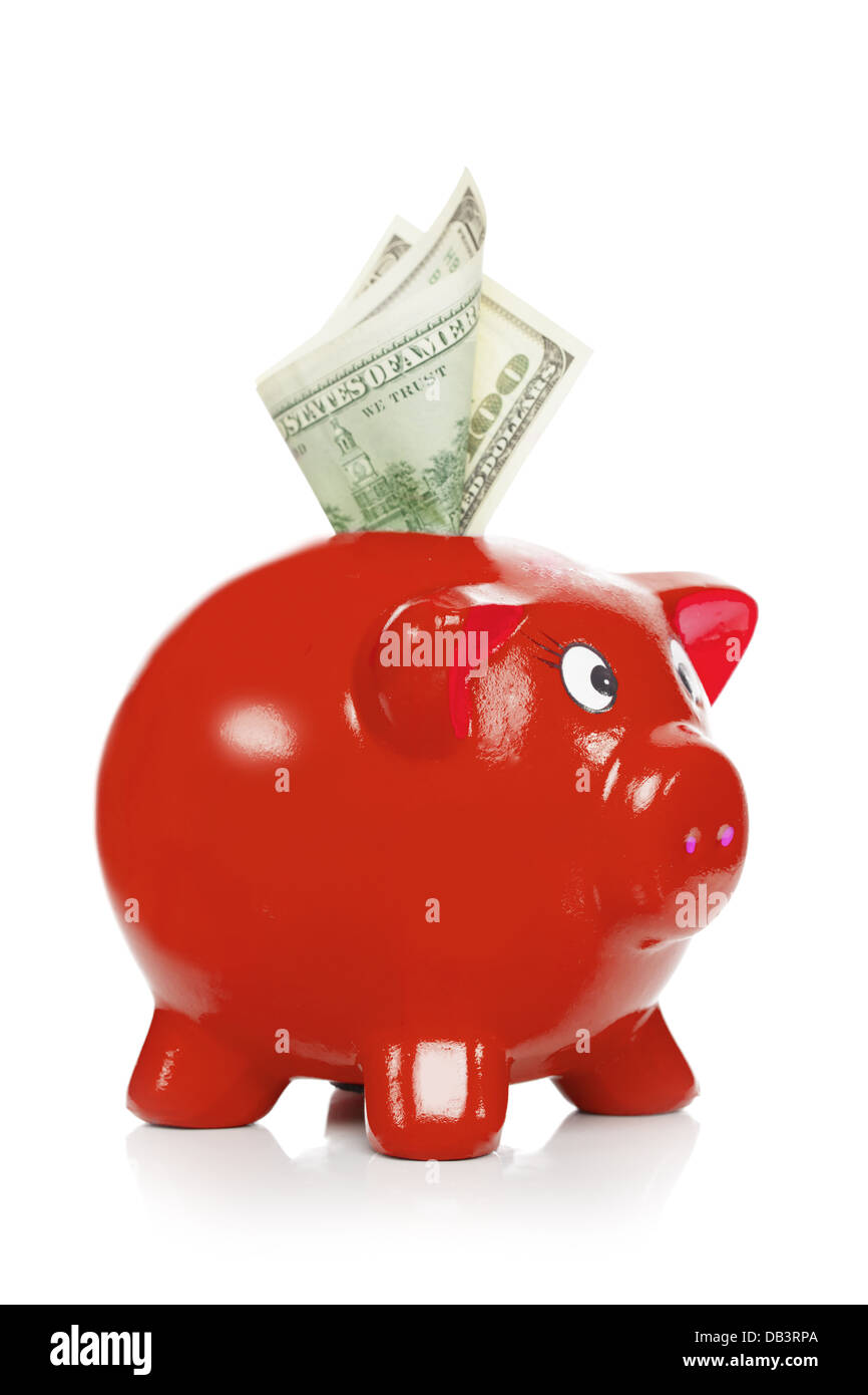 Red piggy bank with dollars sticking out - isolated on white background ...