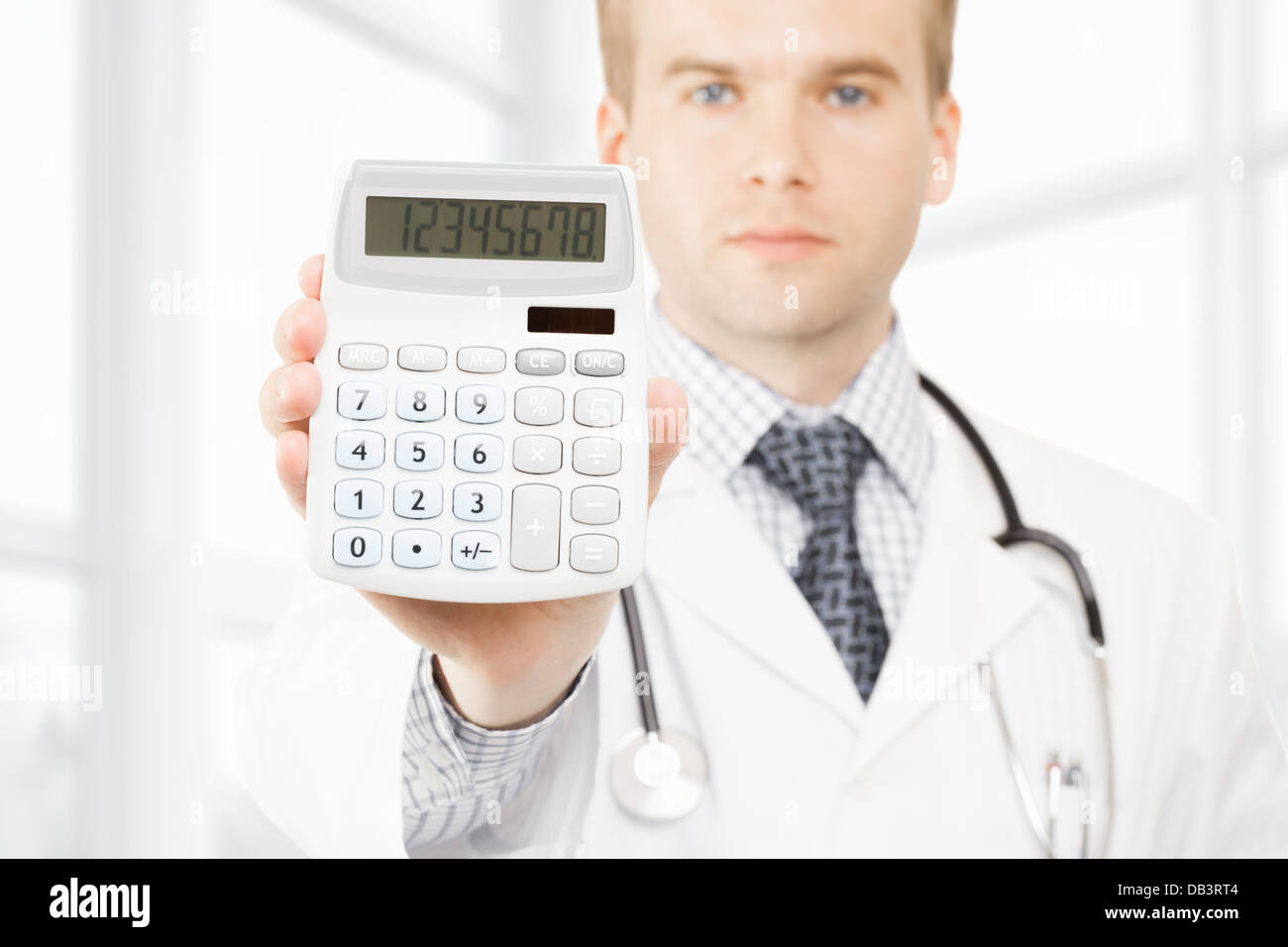 Calculated hospital bill hi-res stock photography and images - Alamy