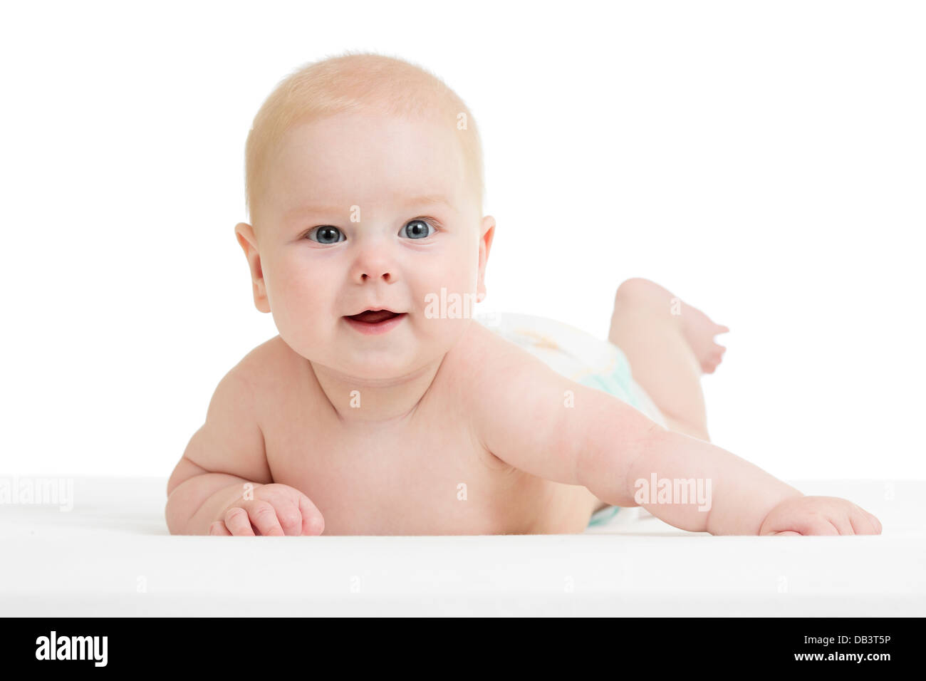 smiling baby boy lying on tummy isolated on white background Stock ...