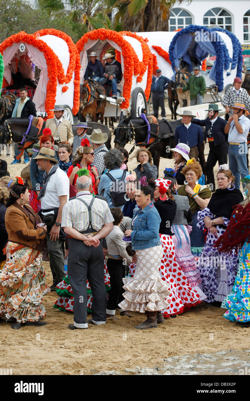 Spanish gypsy horse-drawn caravans and pilgrims making the Catholic ...