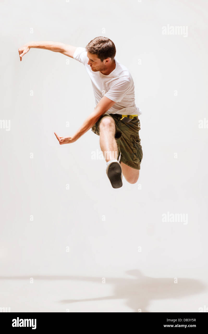 male dancer jumping in the air Stock Photo - Alamy