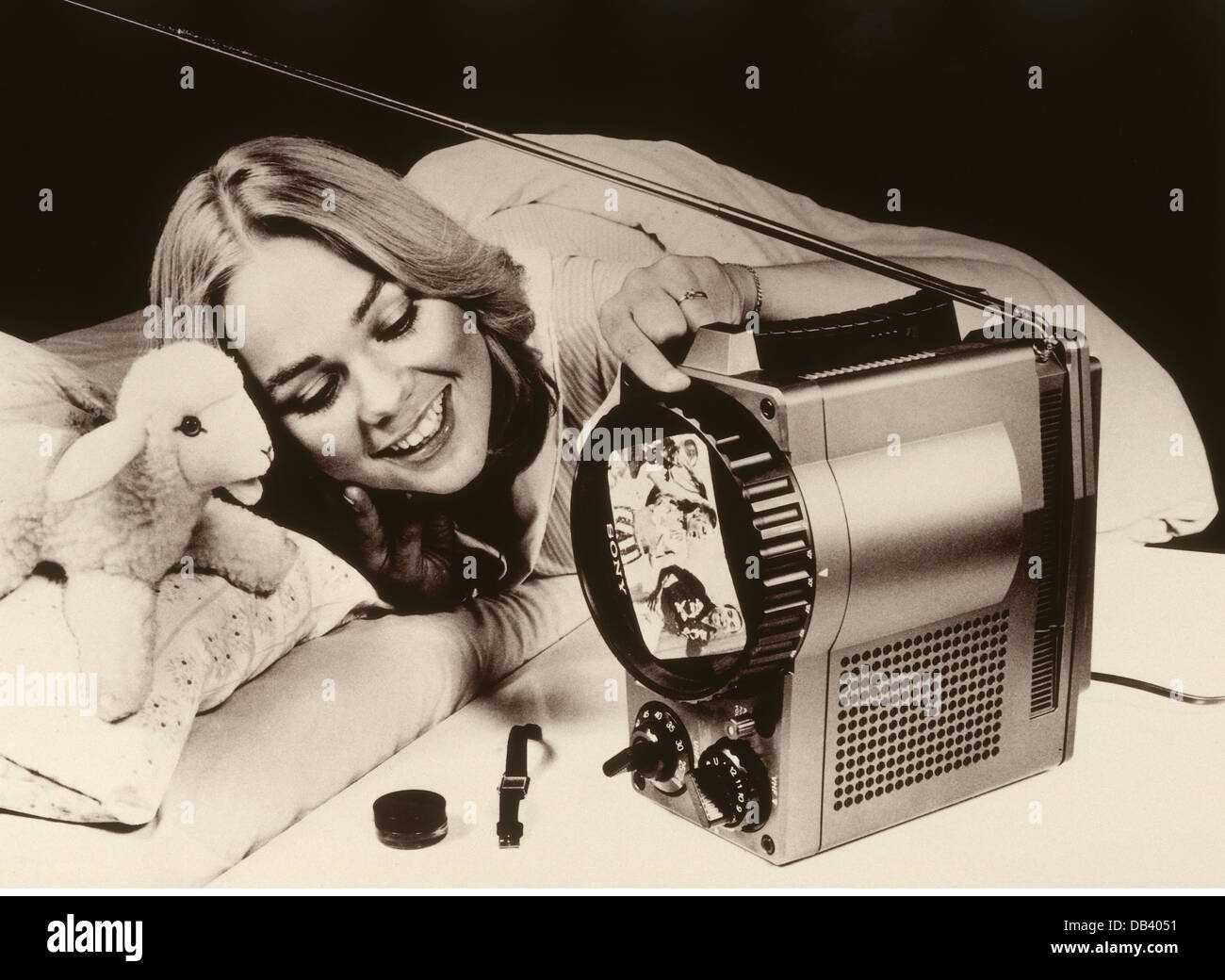 broadcast, radio, woman with radio set, lying in bed, 1970s ...