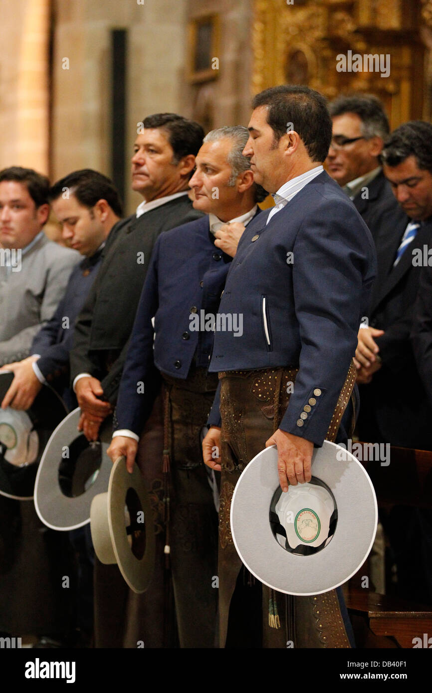 Spanish horsemen dressed in Andalusian style clothes attending a ...