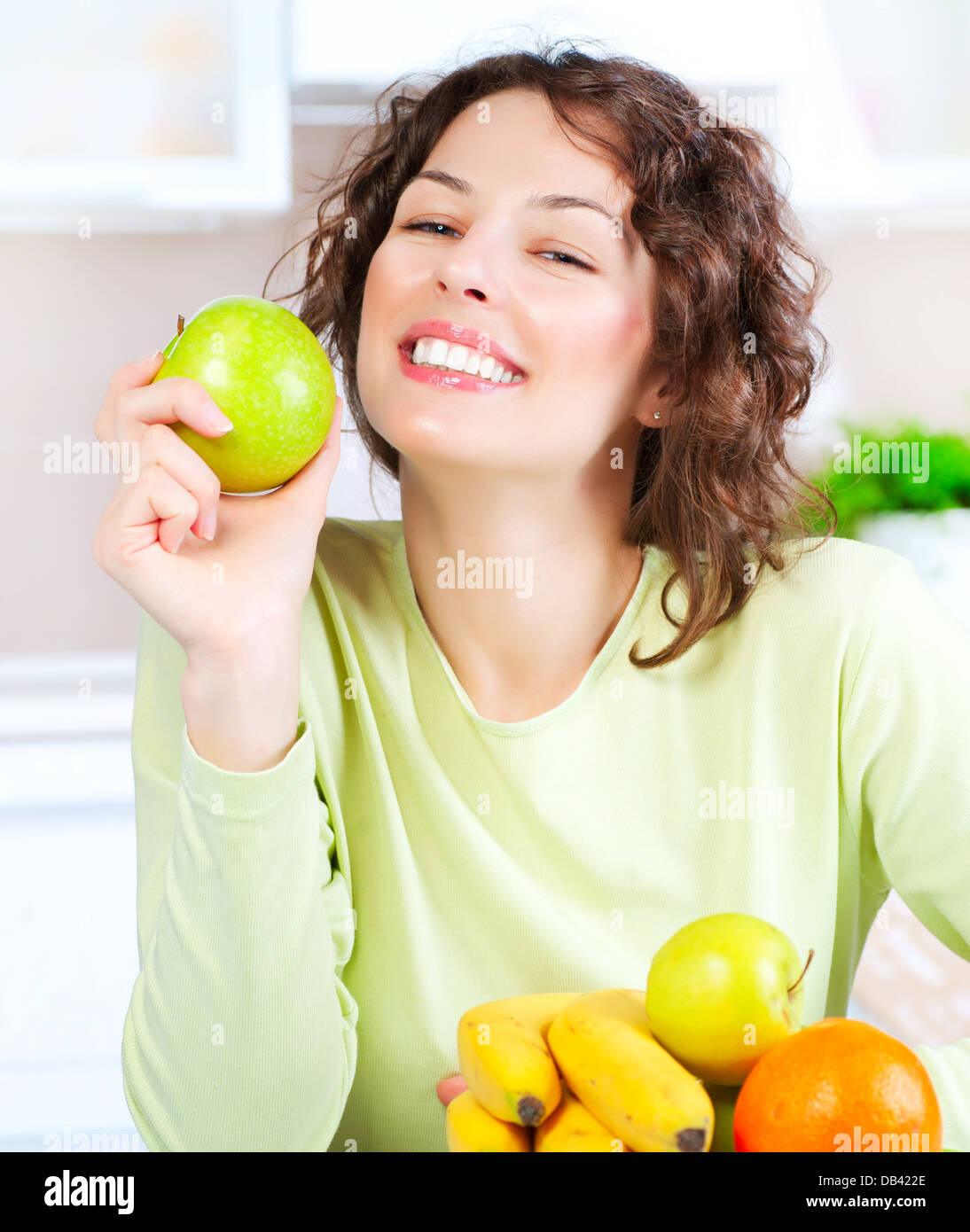 Diet. Happy Young Woman Eating Fresh Fruit Stock Photo - Alamy