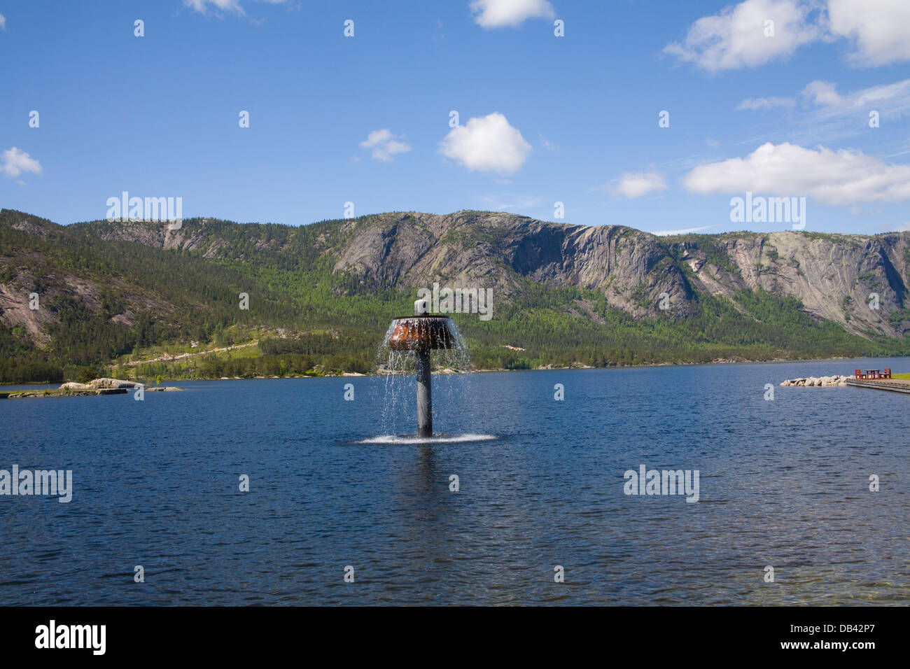 Treungen Telemark Norway Europe Fountain in Lake Nisser surrounded by ...