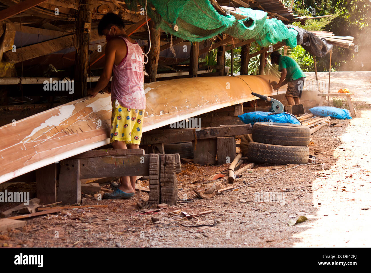 Carpenter is building a boat Stock Photo - Alamy